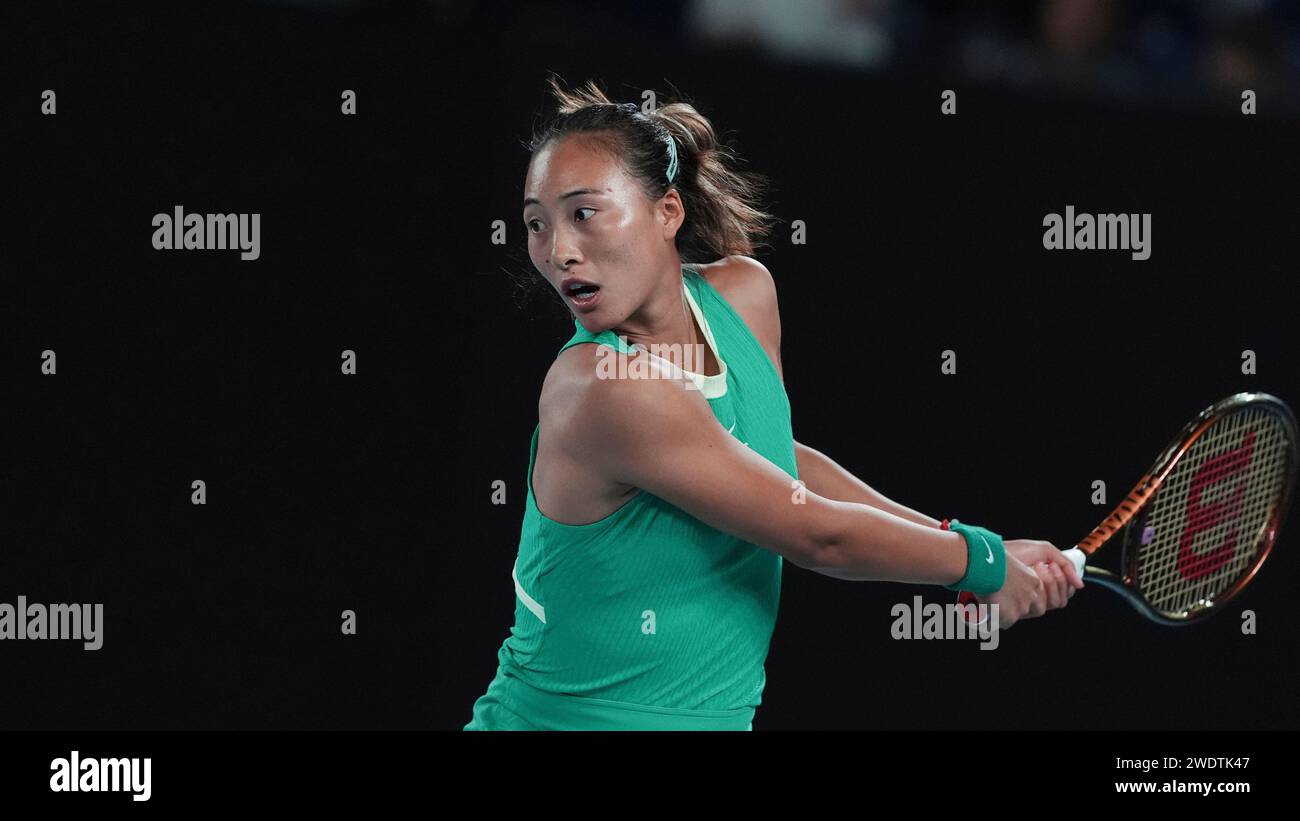Zheng Qinwen of China plays a backhand return to Oceane Dodin of France during their fourth ...