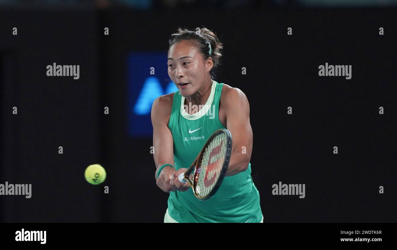 Zheng Qinwen of China Oceane Dodin of France during their fourth round match at the Australian ...