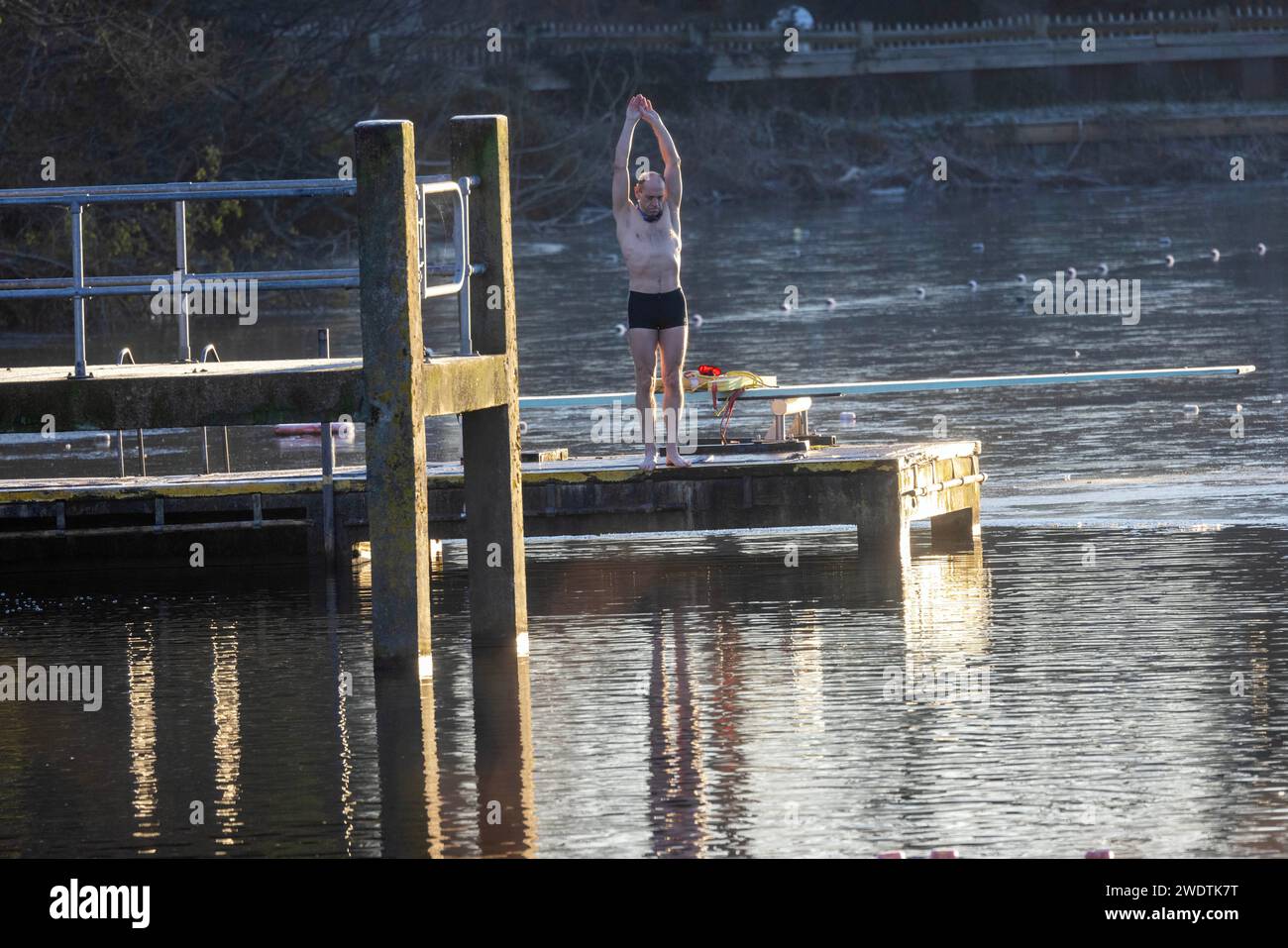 Pic shows:Sunrise over London as Early morning dog walkers at Hampstead ...