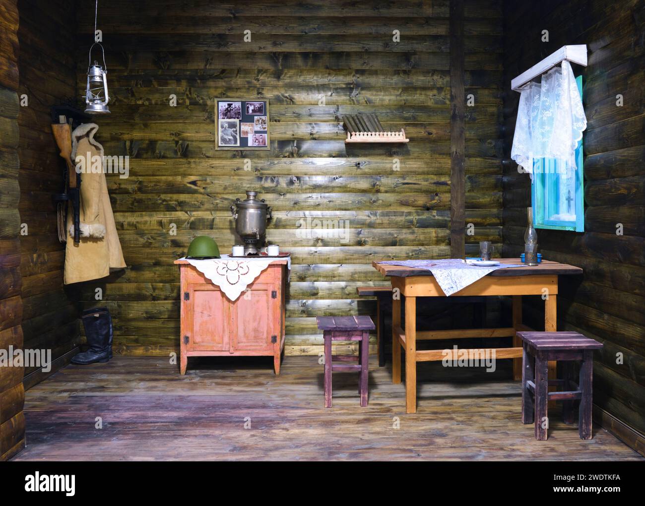 A diorama, recreation of a typical cabin, wood bunker with tea samovar ...