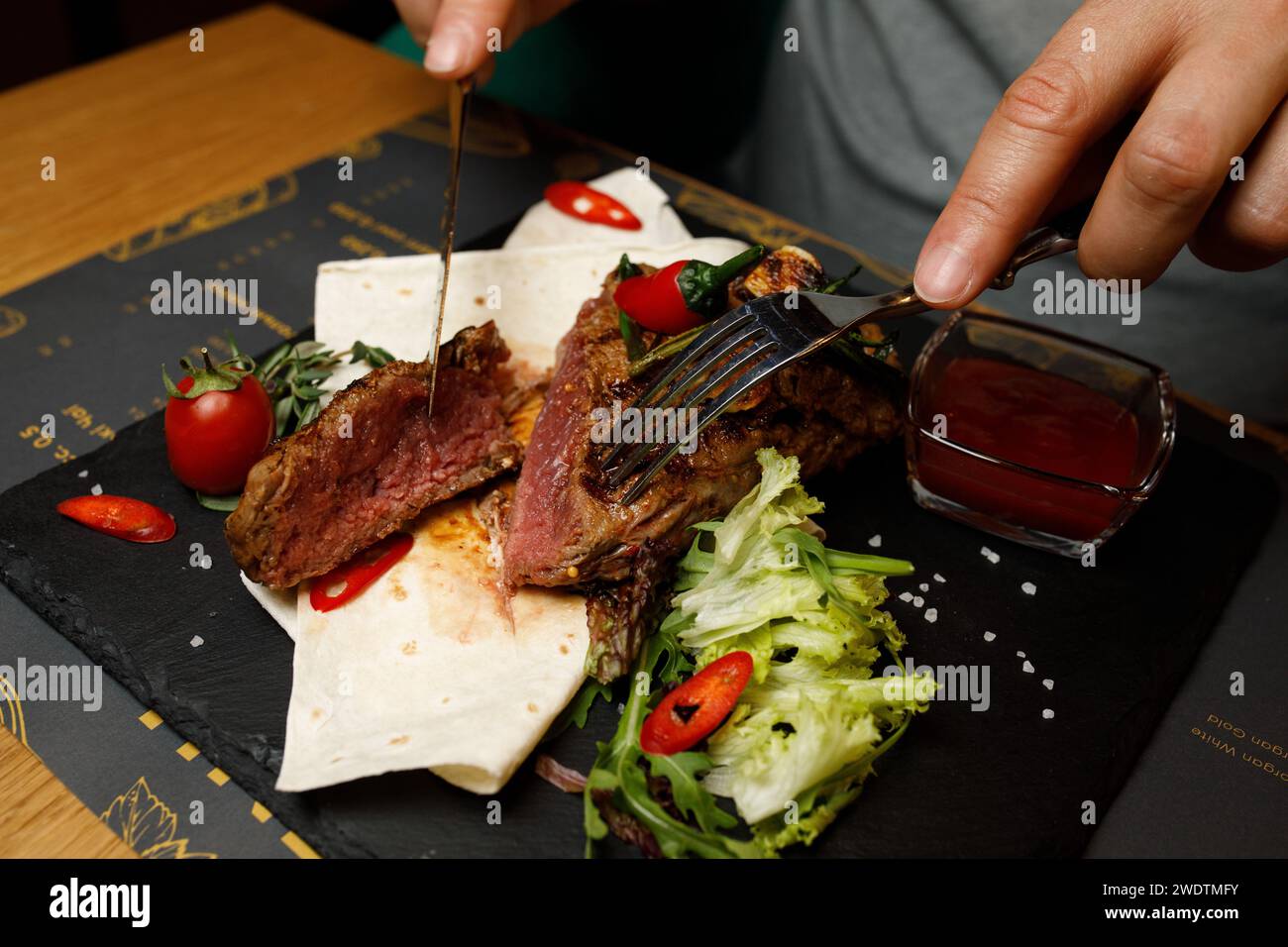 steak on the board, restaurant meat hand. High quality photo Stock ...