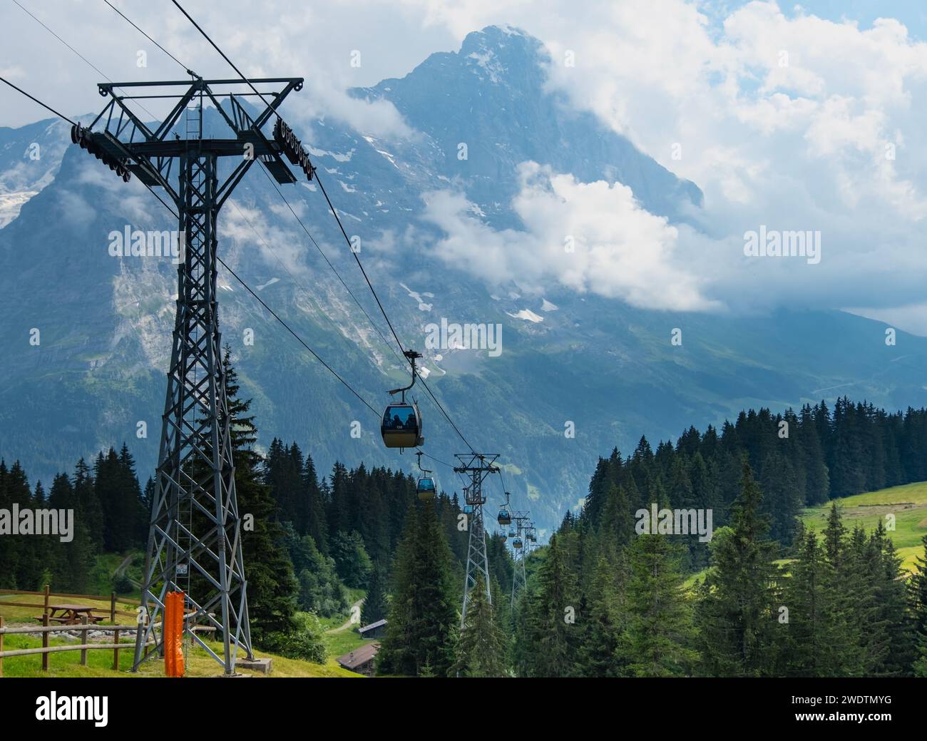 Cable car in Swiss Alps. Gondola from Grindelwald in Jungfrau. Summer ...