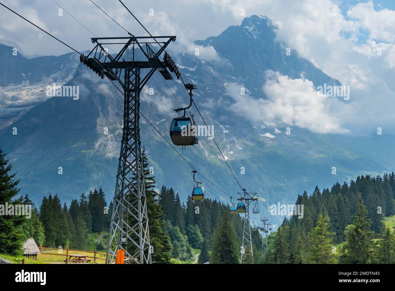 Cable car in Swiss Alps. Gondola from Grindelwald in Jungfrau. Summer ...