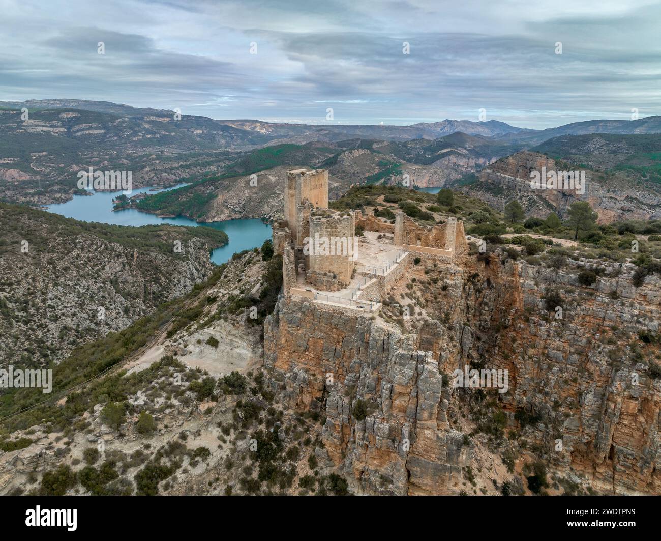 Aerial panoramic view of Chirel castle atop a rocky crag jutting out ...