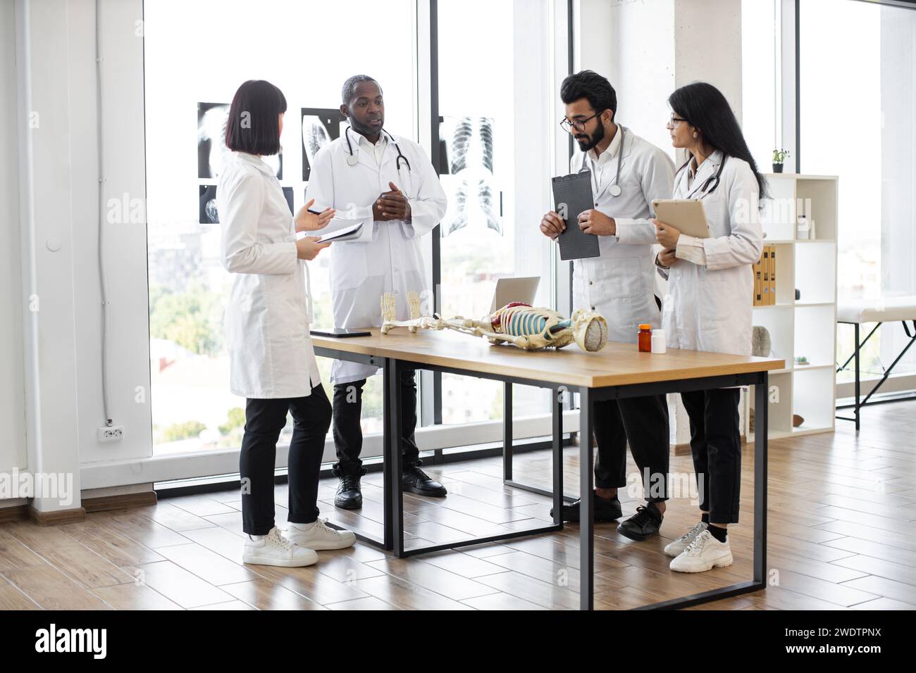 Human skeleton model on the table in classroom Stock Photo - Alamy