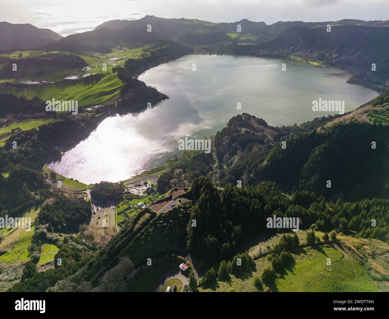 Hot and geothermal pools with park and mountains with forest in the ...