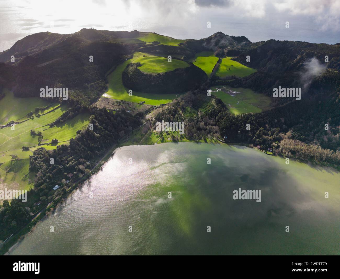 Hot and geothermal pools with park and mountains with forest in the ...