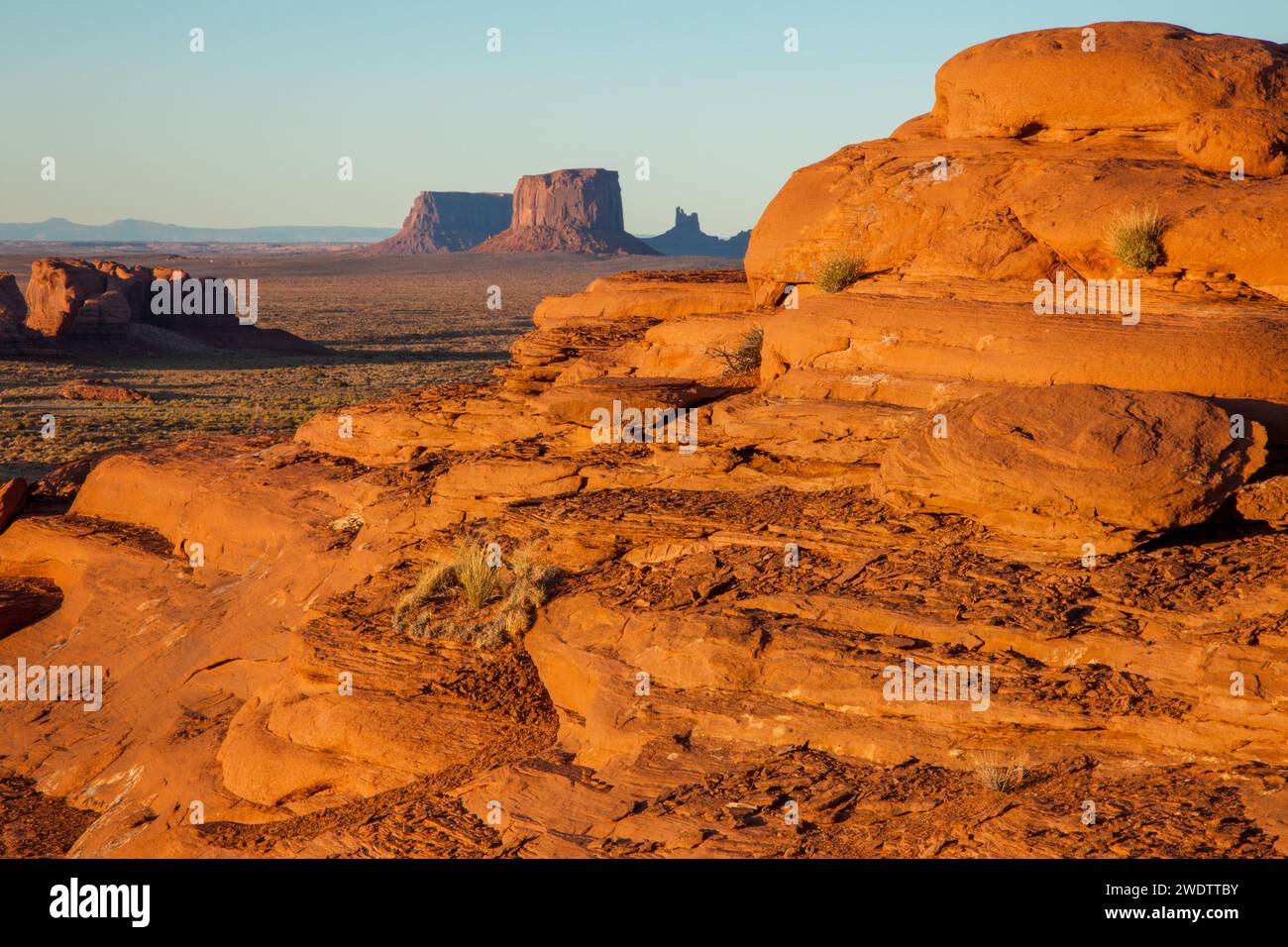 Colorful eroded sandstone at sunset in Mystery Valley in the Monument ...