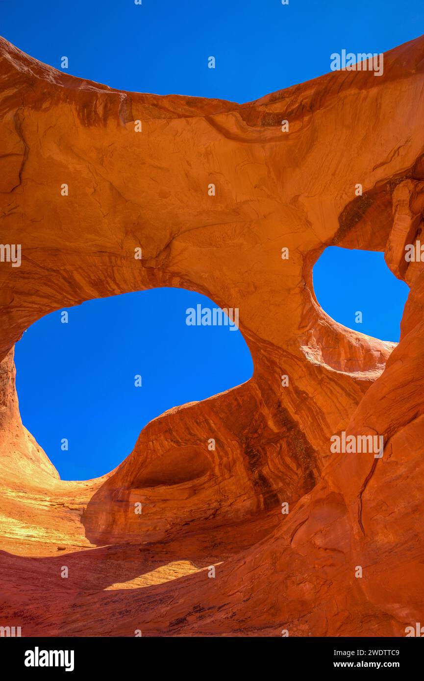 Spiderweb Arch, a large natural double arch in the Monument Valley ...
