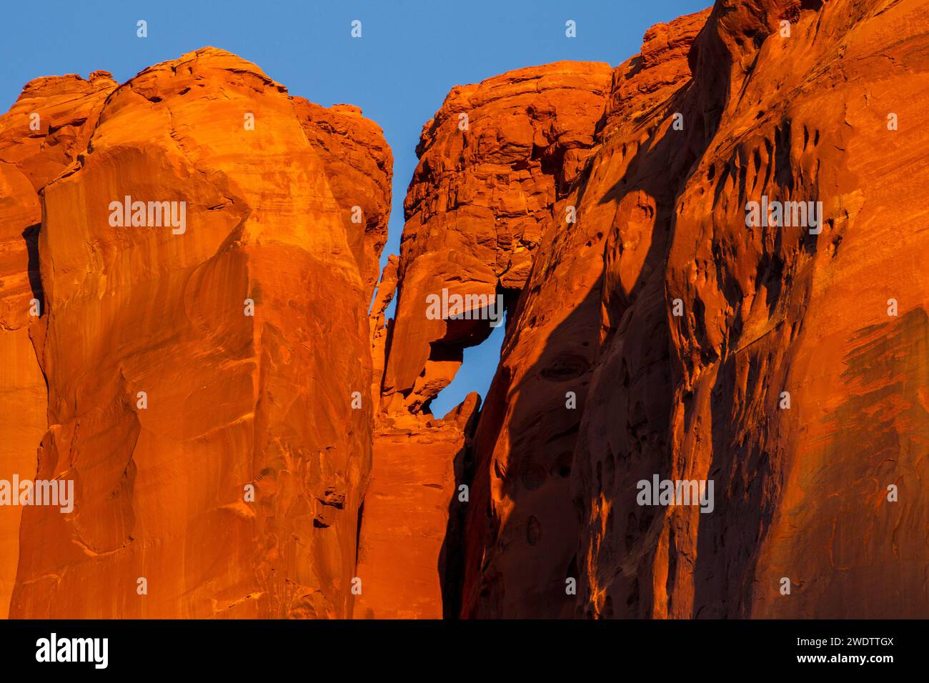 A small sandstone arch on Elephant Butte in the Monument Valley Navajo ...