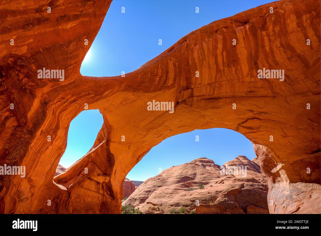 Spiderweb Arch, a large natural double arch in the Monument Valley ...