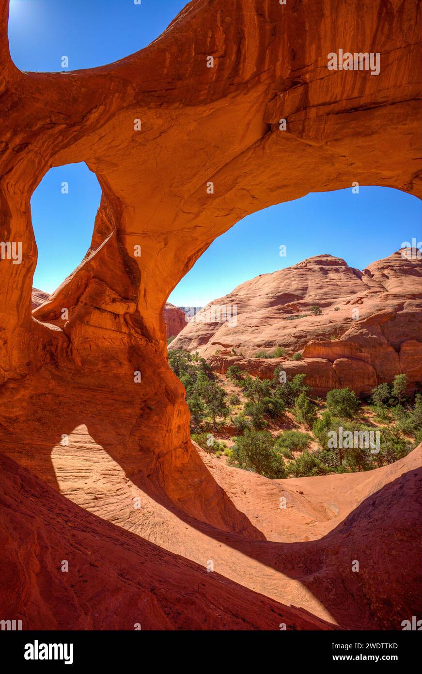 Spiderweb Arch, a large natural double arch in the Monument Valley ...