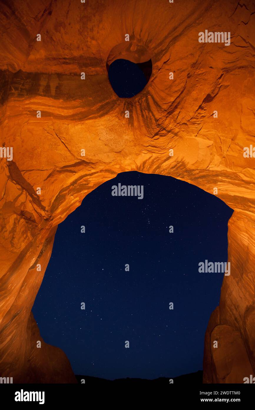 The Orion constellation through the Big Hogan Arch at night in the ...