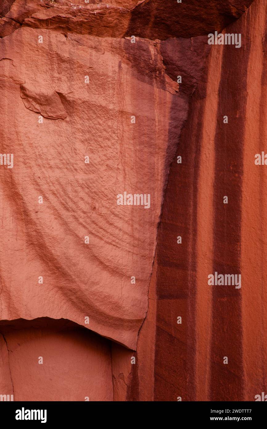 Colorful stripes of mineral deposits called desert varnish on sandstone ...