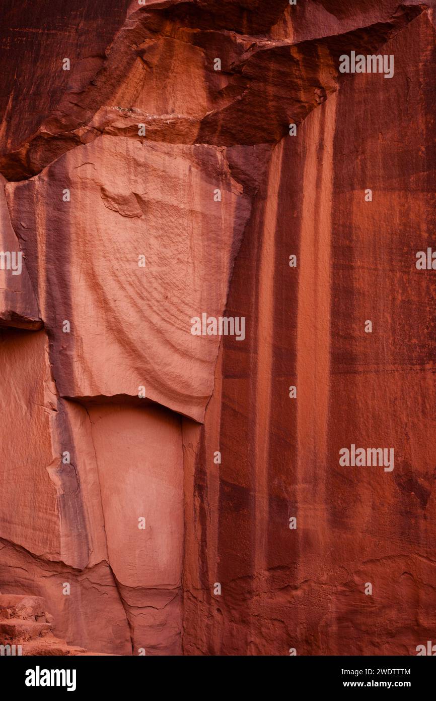 Colorful stripes of mineral deposits called desert varnish on sandstone ...