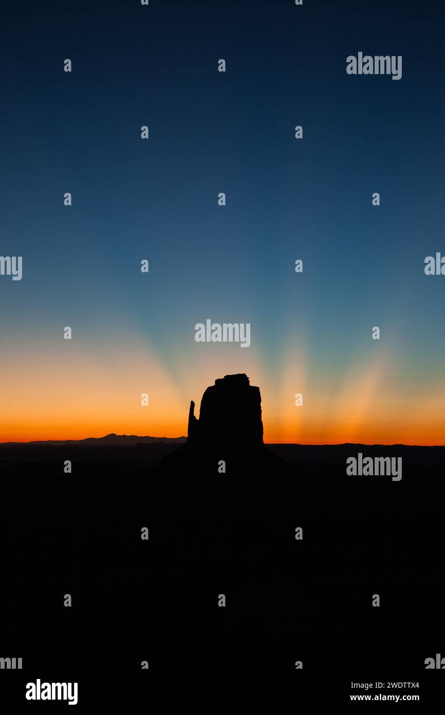 Crepuscular sun rays over the East Mitten before dawn in the Monument ...