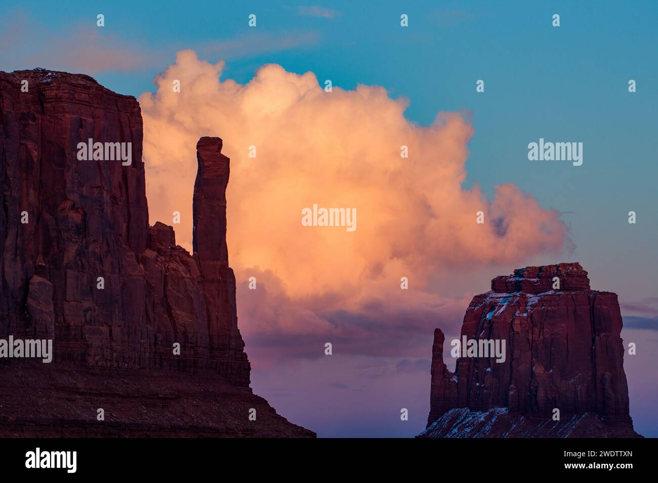 The Mittens in shadow at sunset in the Monument Valley Navajo Tribal ...