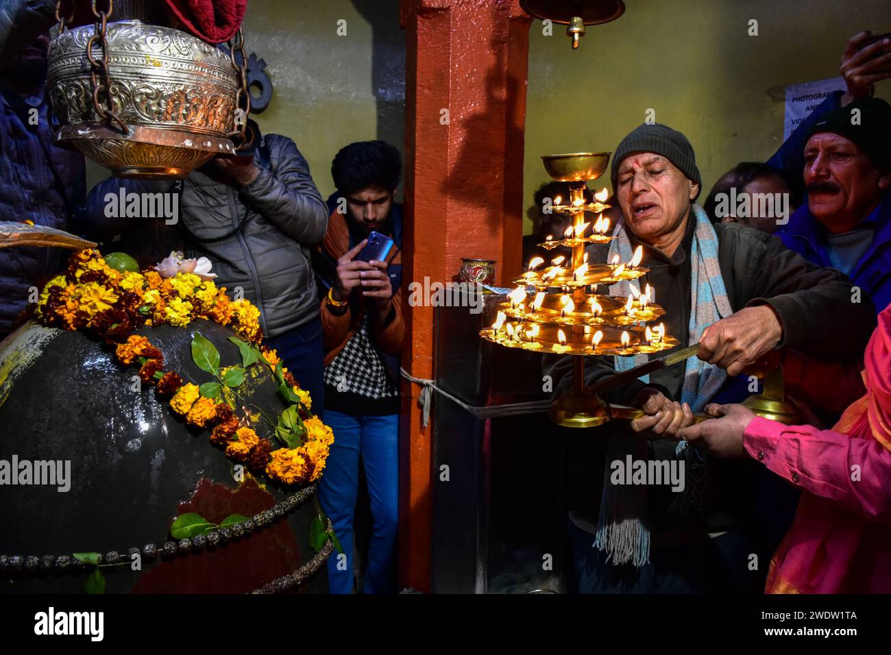 Hindu devotees perform rituals at the Shankaracharya temple on the ...