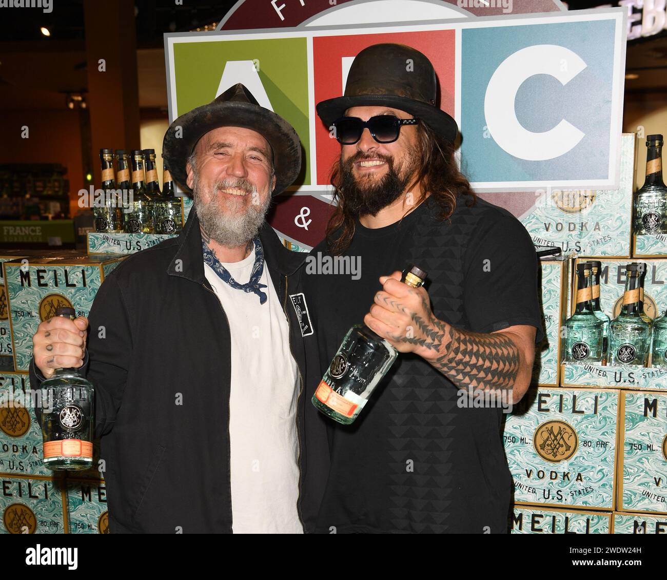 Jason Momoa and Blaine Halvorson attend The Meili Vodka Bottle Signing ...