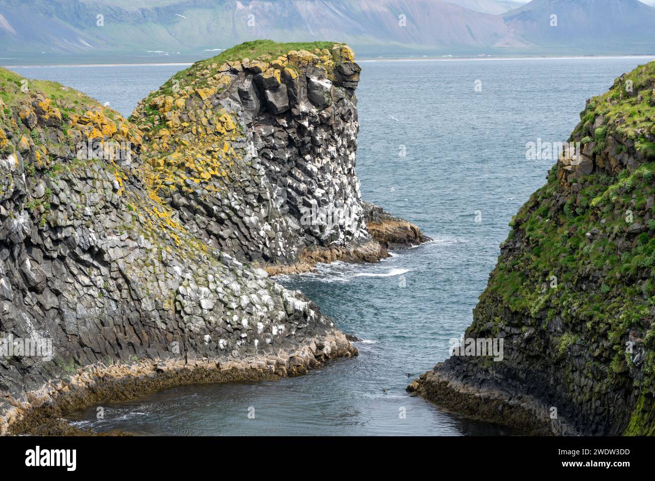 Basalt cliffs along the rugged shoreline of Arnarstapi Iceland Stock ...