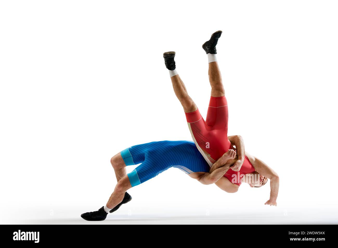 Dynamic shot of two professional Greco-Roman wrestlers in red and blue ...