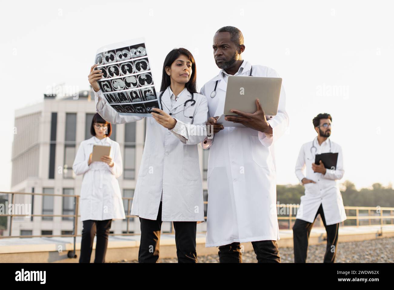 Doctors analyzing mri scan results hi-res stock photography and images ...
