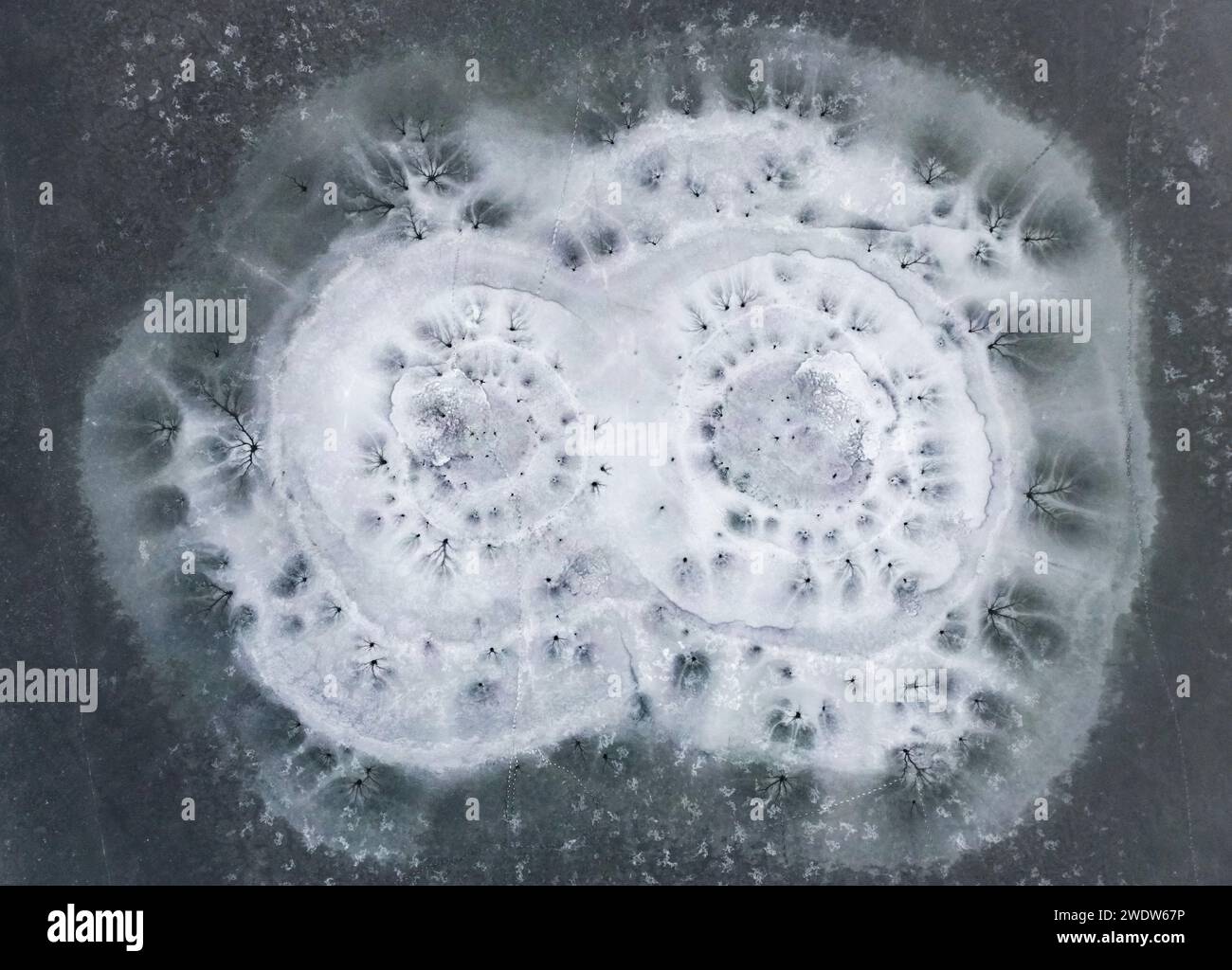 Treplin, Germany. 22nd Jan, 2024. Cracks appear in the ice of Lake ...