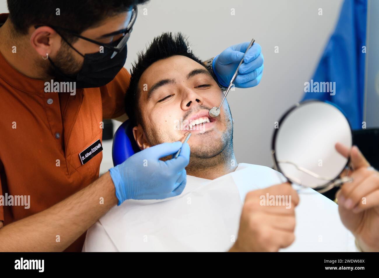 Expert dental whitening procedure in progress Stock Photo - Alamy
