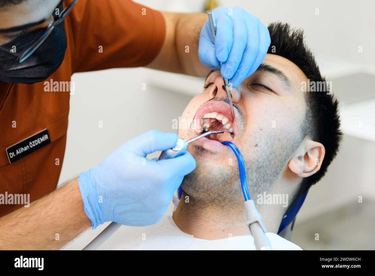 Expert dental whitening procedure in progress Stock Photo - Alamy