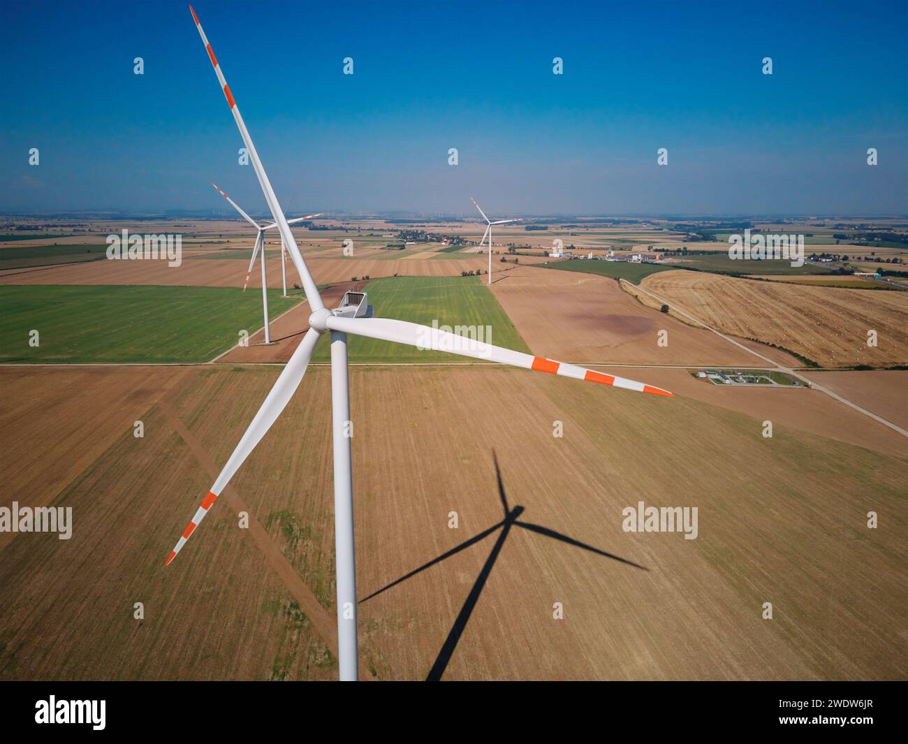 Aerial view of wind turbine in countryside area, Wind power plants in ...