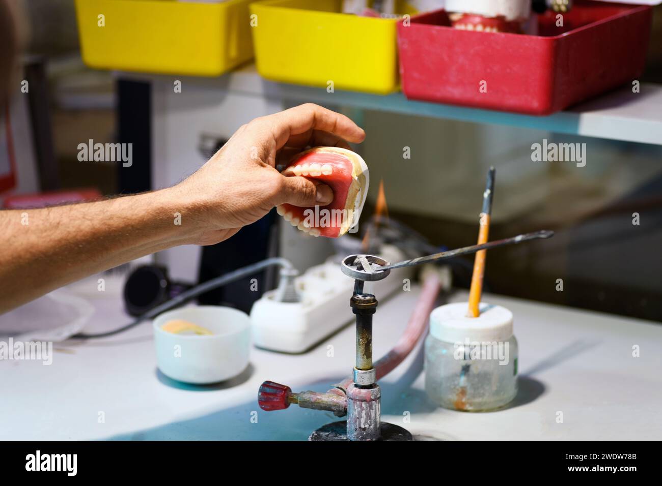 Close up of prosthetic dental craftsmanship, showcasing the detailed ...
