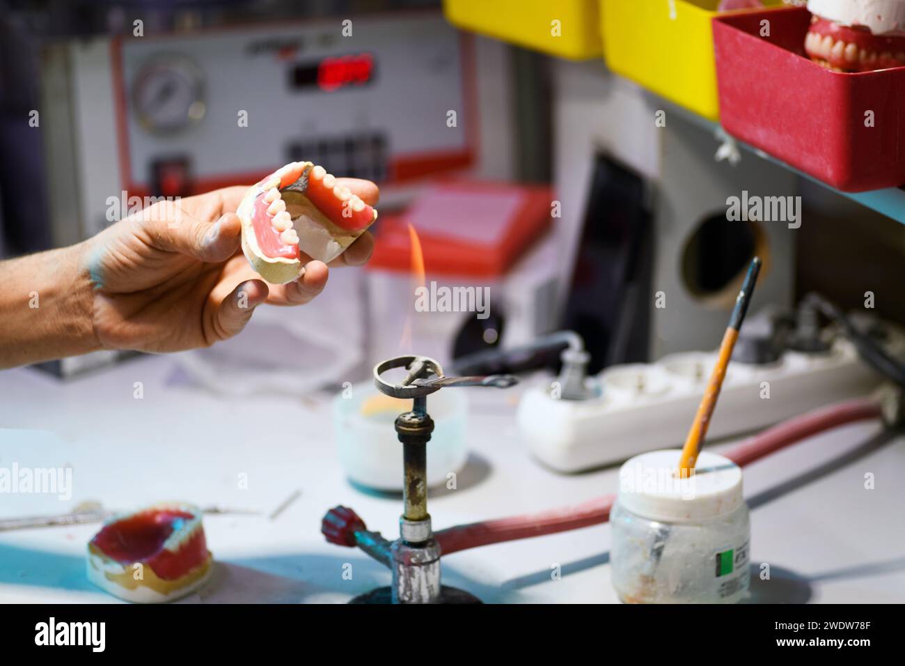 Close up of prosthetic dental craftsmanship, showcasing the detailed ...