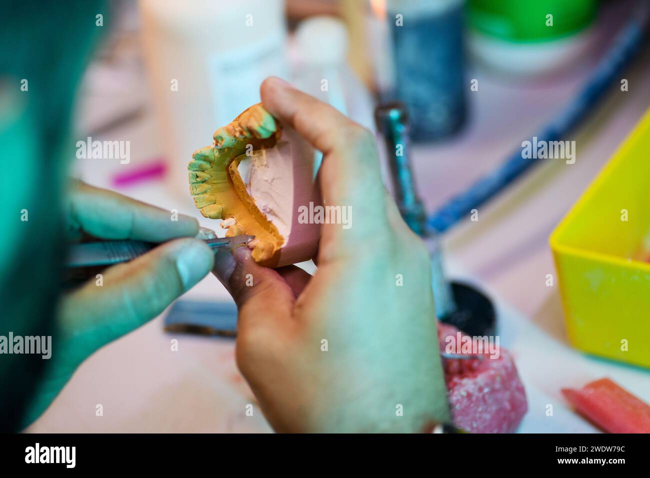 Close up of prosthetic dental craftsmanship, showcasing the detailed ...