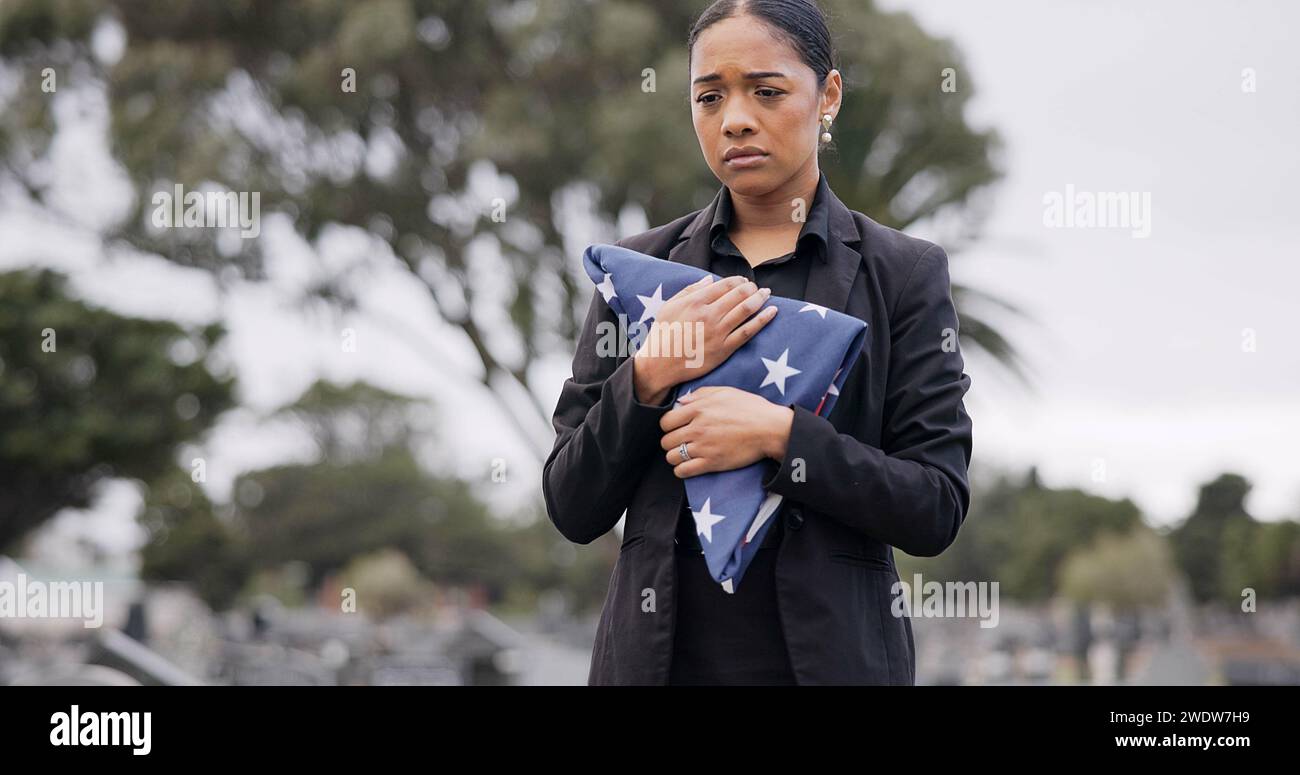 Funeral, death and american flag with a woman in a graveyard for ...