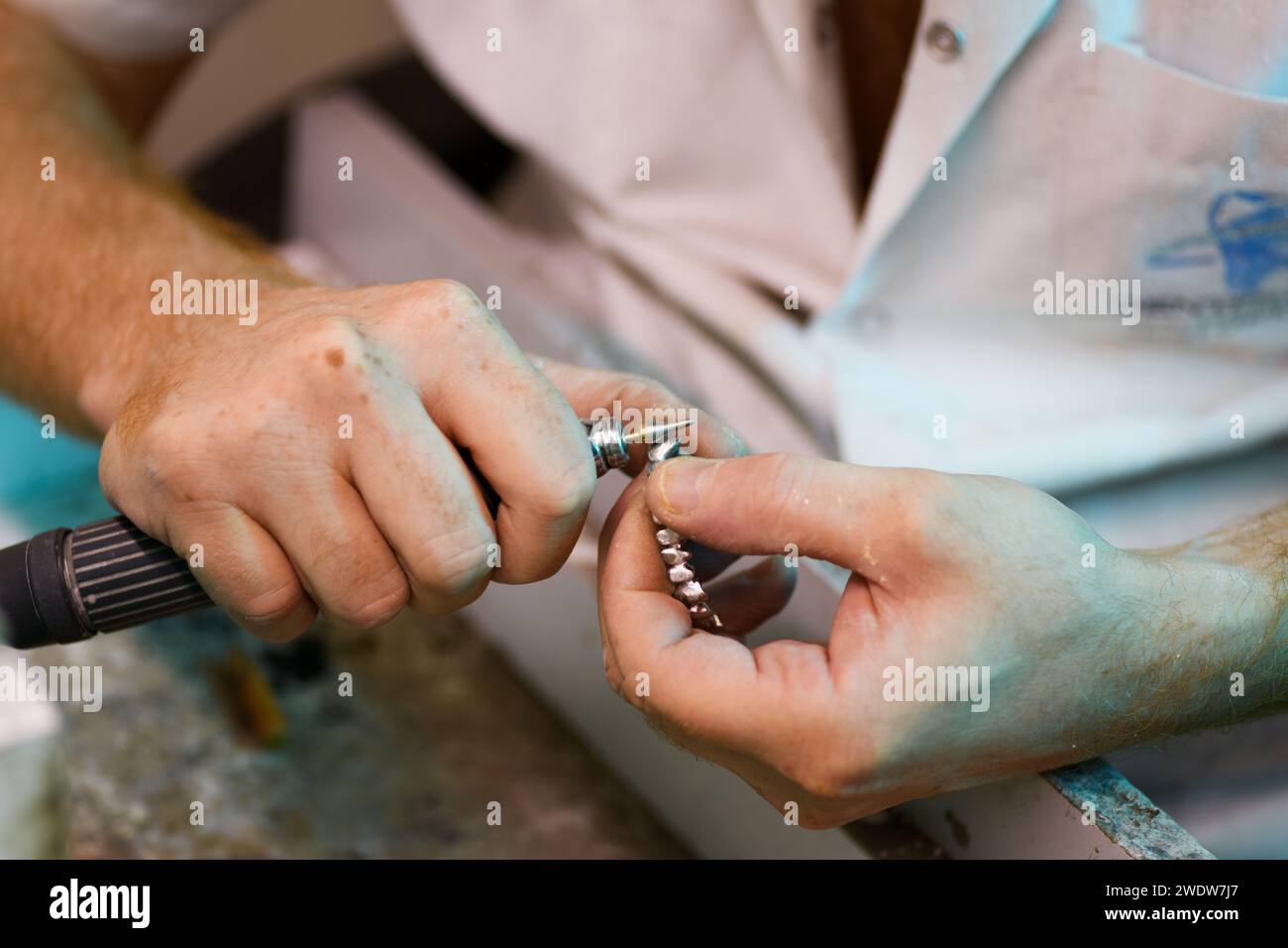 Close up of prosthetic dental craftsmanship, showcasing the detailed ...