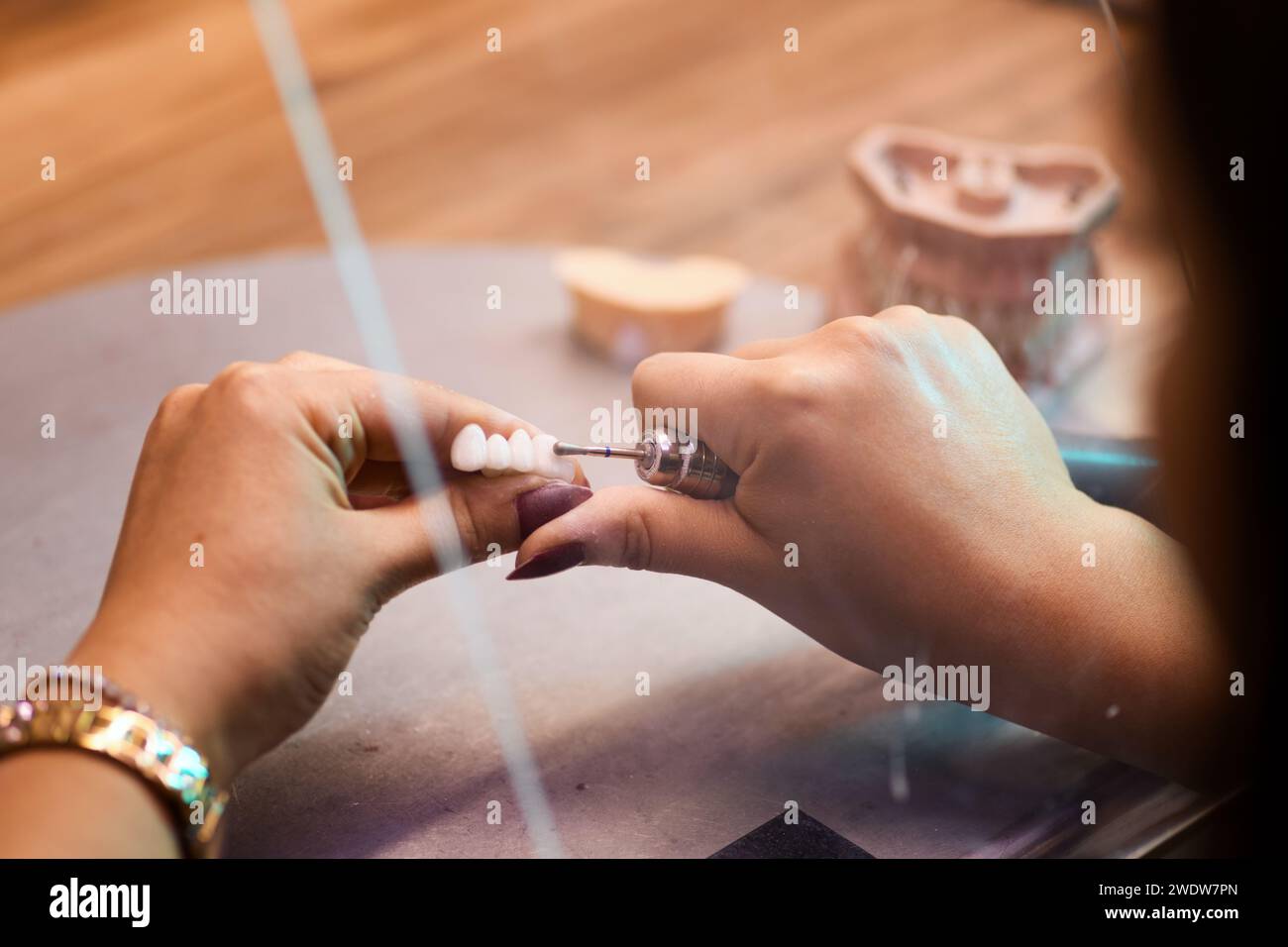 Close up of prosthetic dental craftsmanship, showcasing the detailed ...