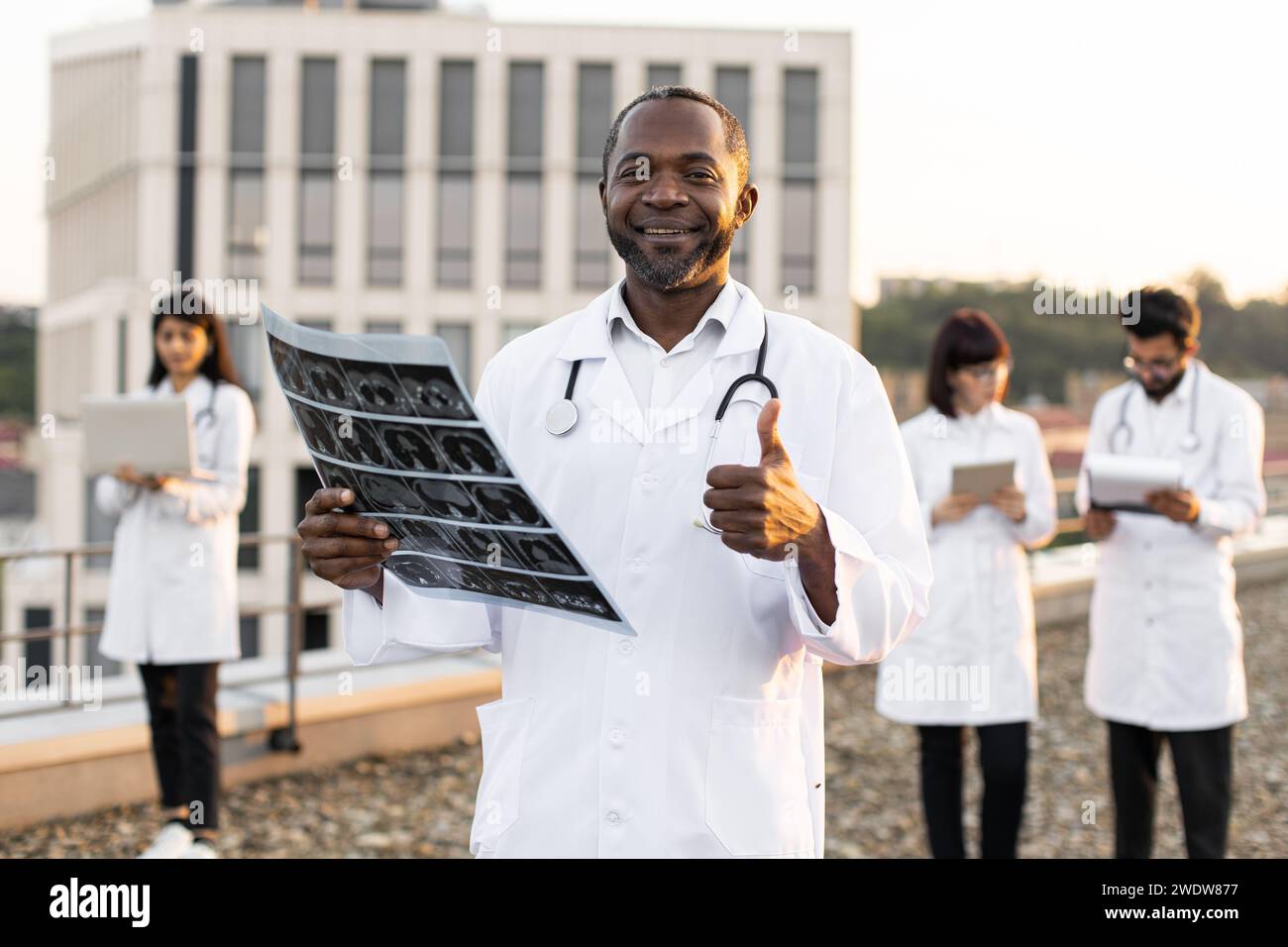 Indian doctor holding up x ray hi-res stock photography and images - Alamy