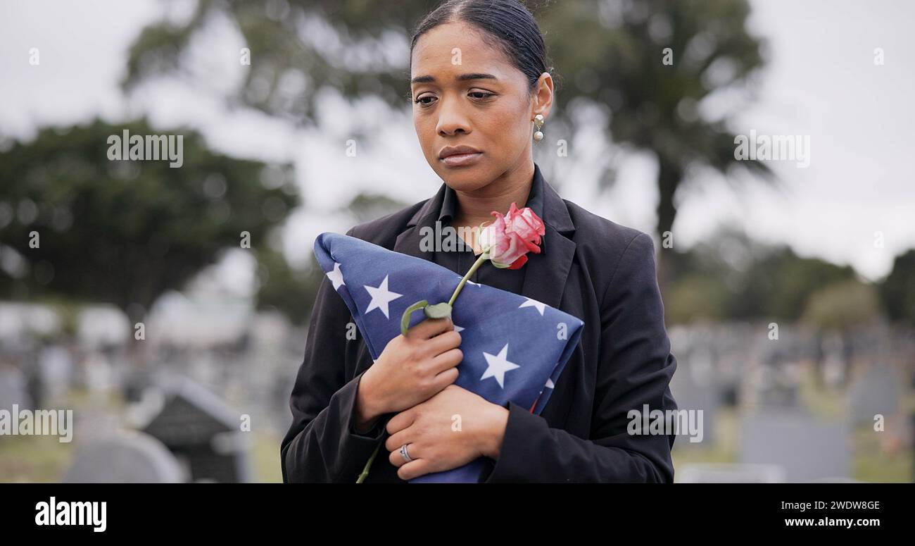 Funeral, death and rose for a woman with a flag at a cemetery in ...