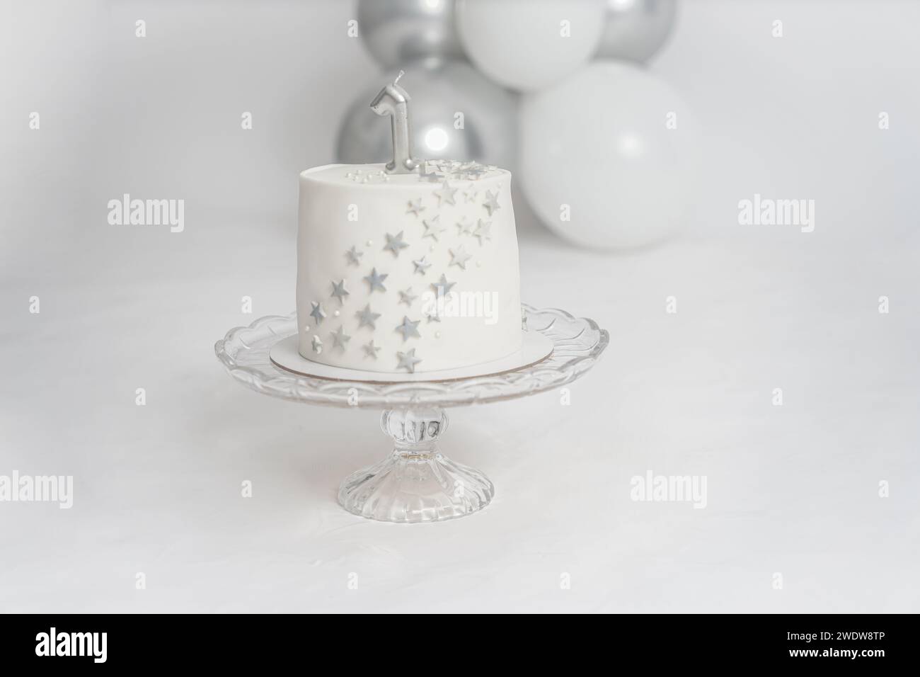 First Birthday cake white and silver 1st birthday cake with copy space ...
