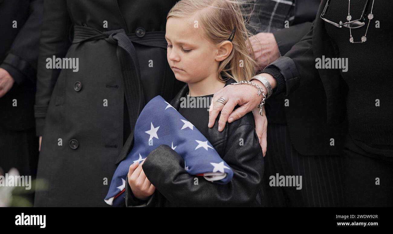 Funeral, cemetery and girl with American flag for veteran for respect ...