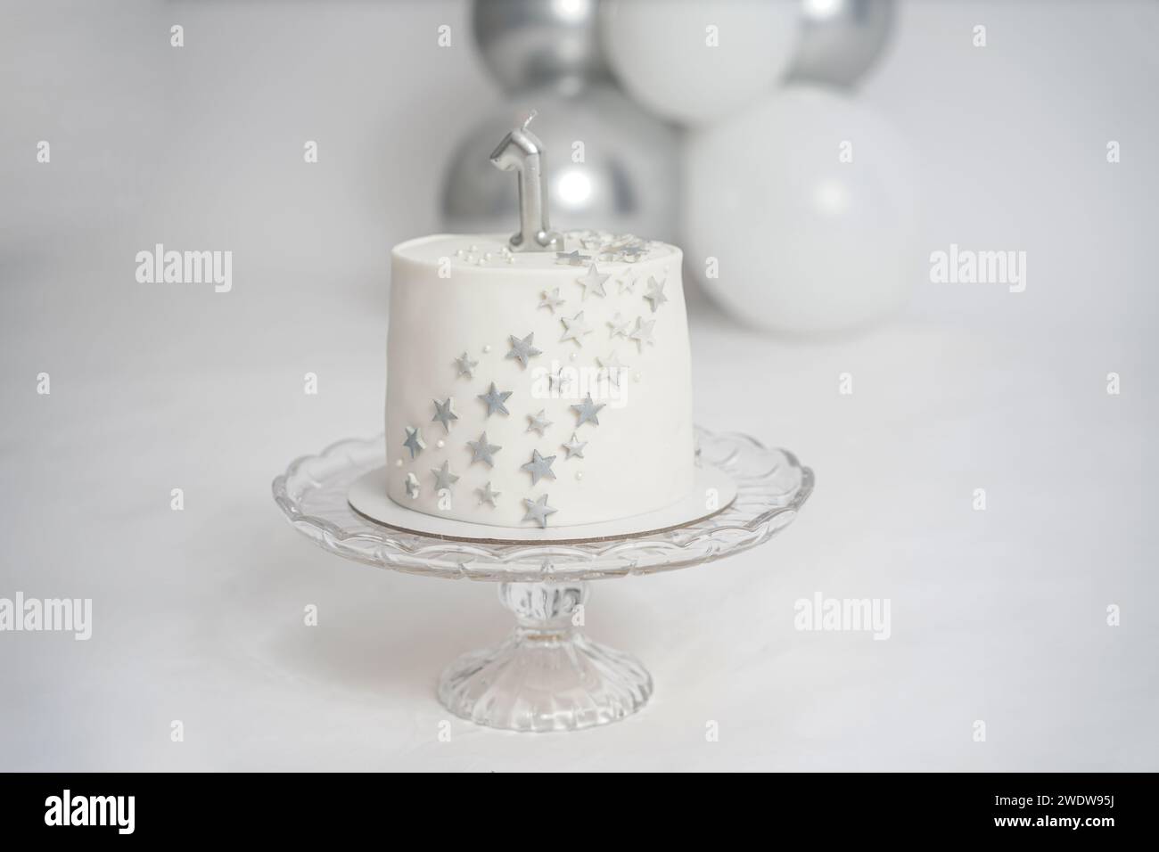 First Birthday cake white and silver 1st birthday cake with copy space ...