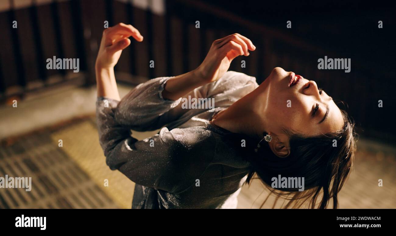 Woman, dancing and street performance at night in Japan for ...