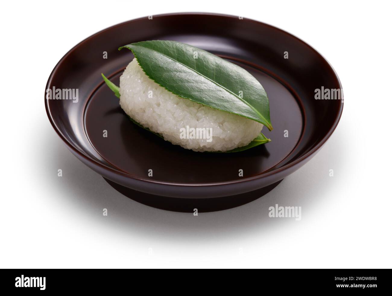 Tsubaki Mochi is Japan's oldest sweet. A glutinous rice cake filled ...