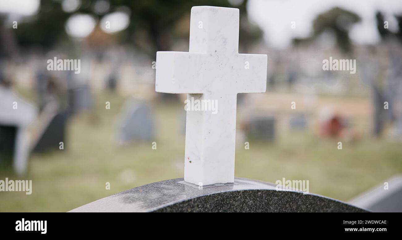 Funeral, graveyard and cross on tombstone for death ceremony, religion ...