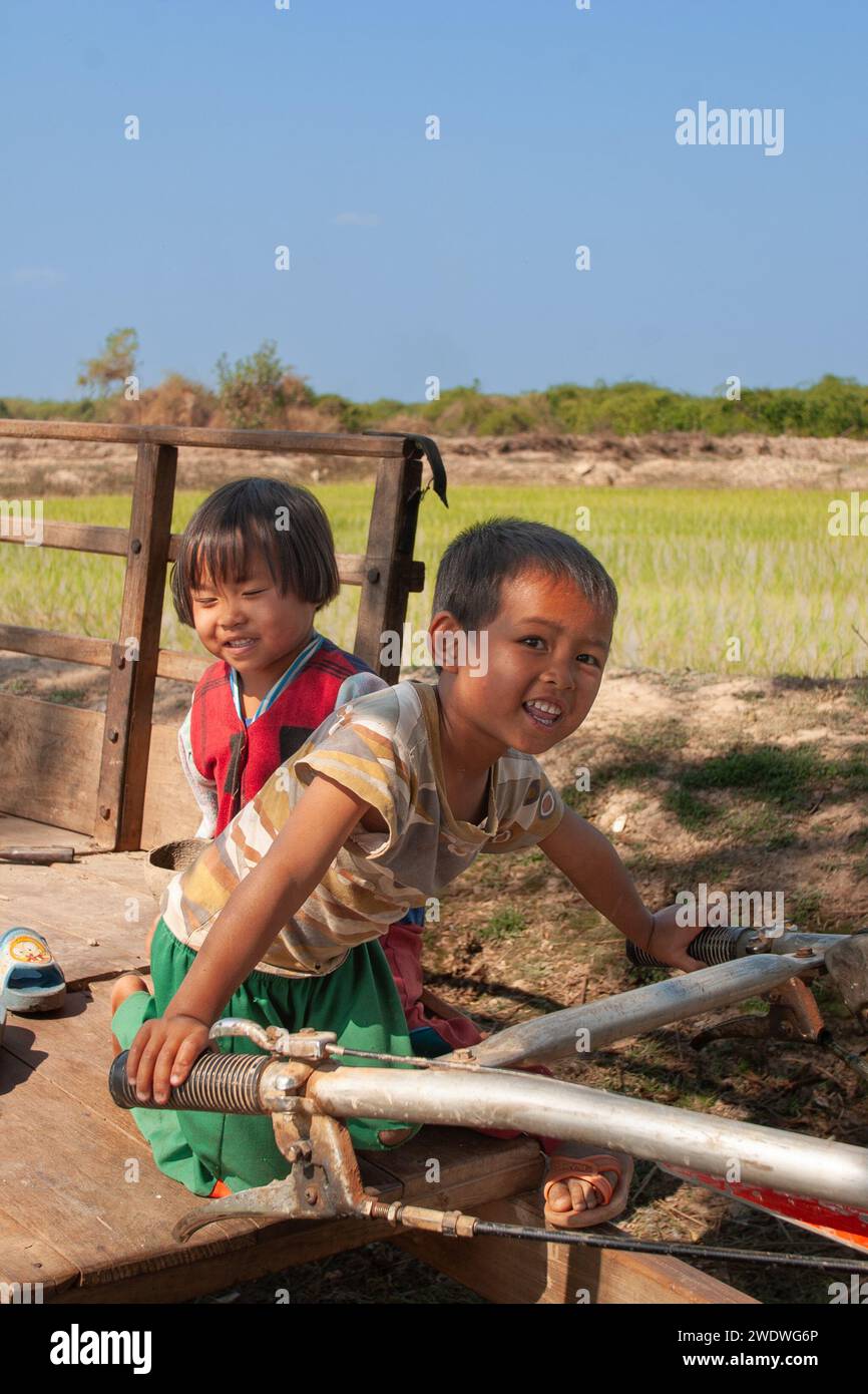 Playful Thai children on a rural farm Stock Photo - Alamy