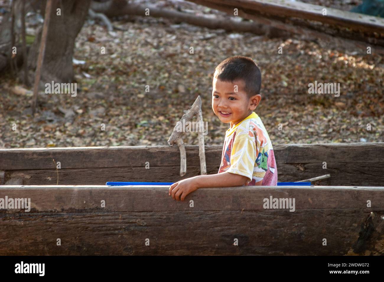 Playful Thai children on a rural farm Stock Photo - Alamy