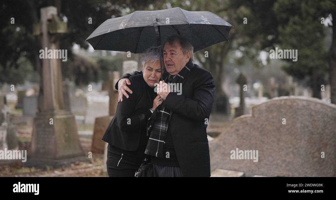 Support, death or old couple in cemetery for funeral, service or burial ...