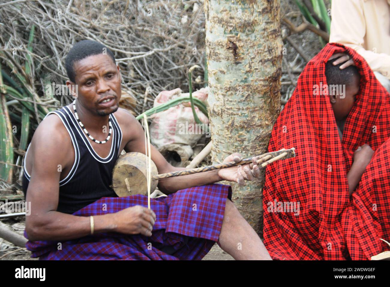 A Datooga man playing a rebab a single-string bowed lute Photographed ...