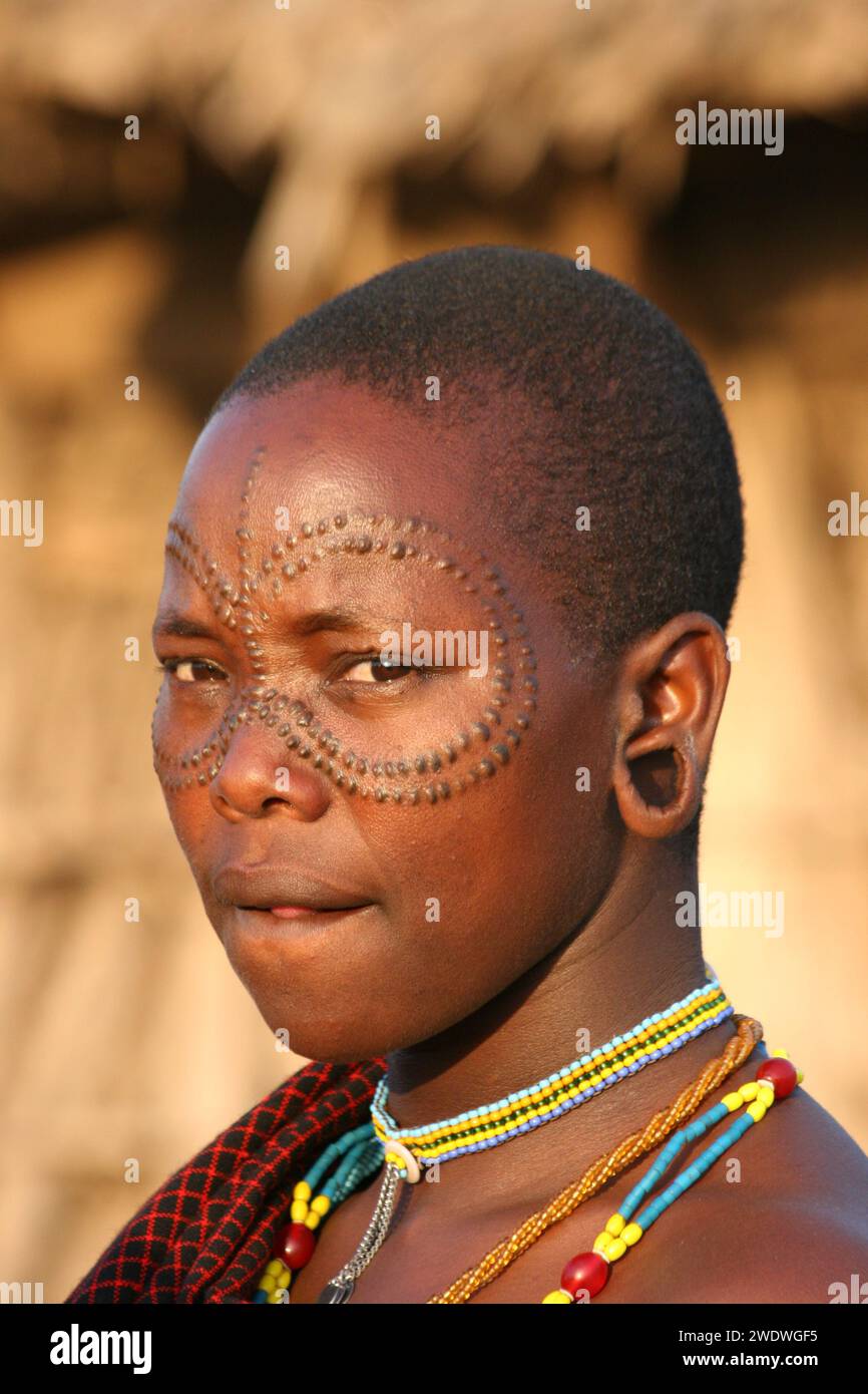 Female members of the Datoga tribe in traditional dress, beads and ...