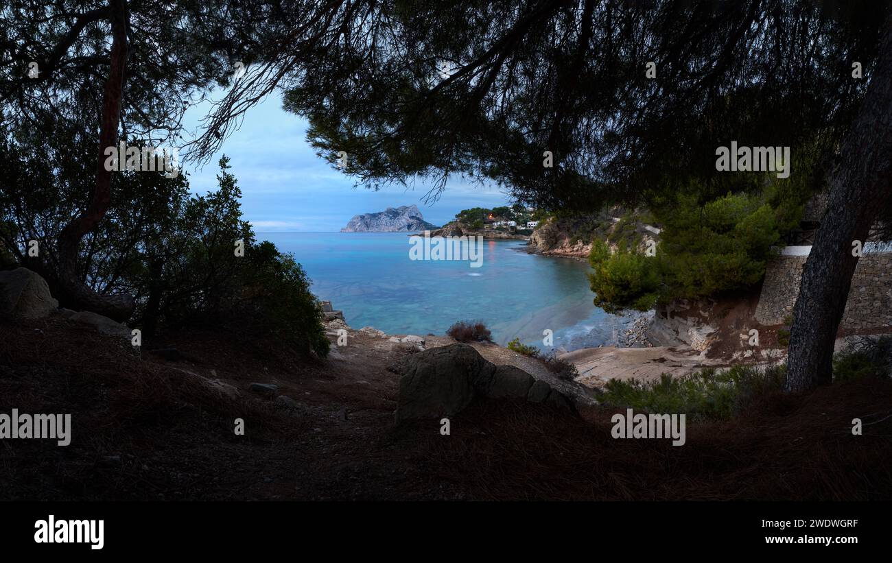 Cala Pinets beach in Benissa (Alicante - Spain) with the Peñon de Ifach ...